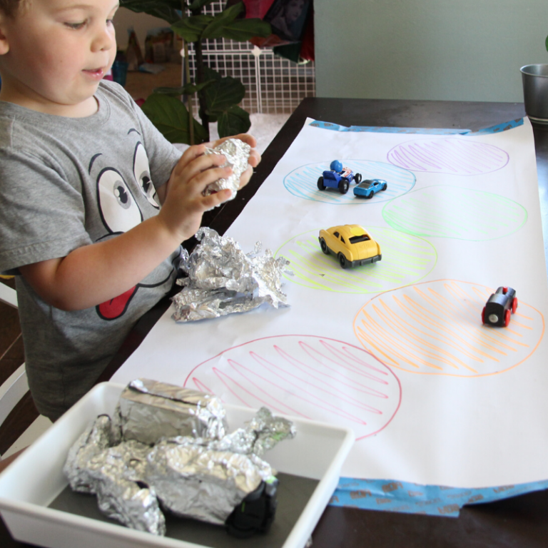 Aluminum Foil Surprise: A fun toddler activity! - Happily Ever Mom
